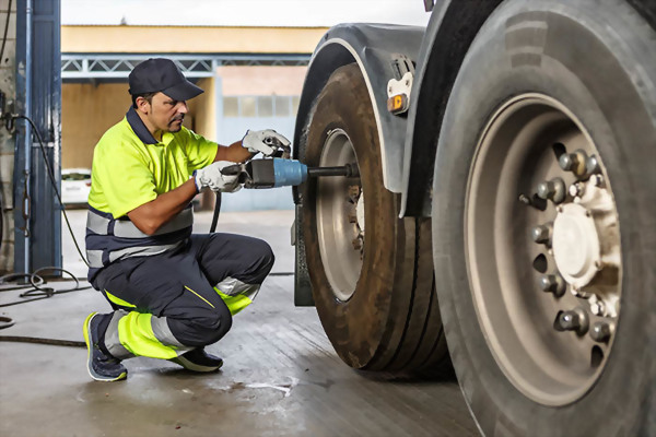 Safely and effectively operate an impact wrench for heavy-duty tasks